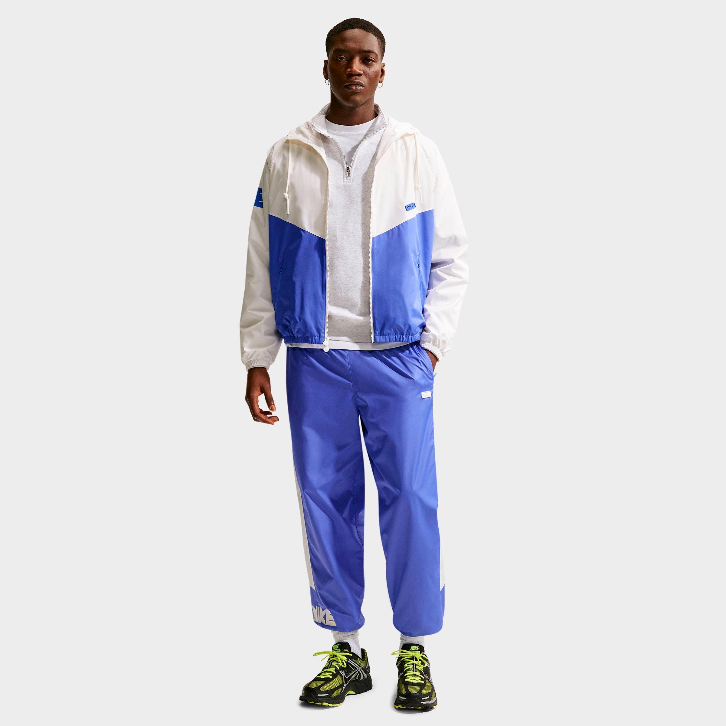 Click here for Nike Mens Windrunner Graphic Woven Pants in Sapphi... prices