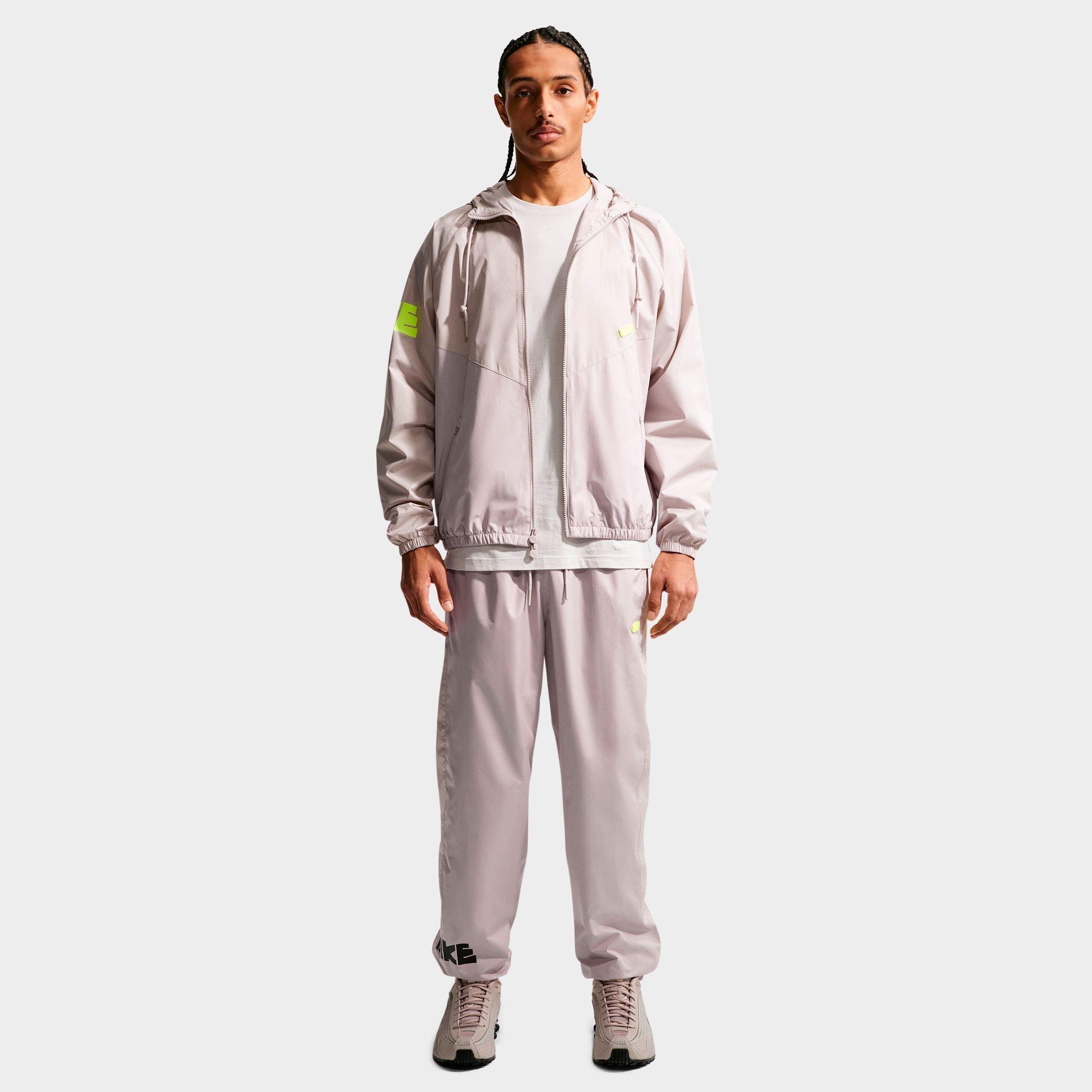 Click here for Nike Mens Windrunner Graphic Woven Jacket in Cream... prices