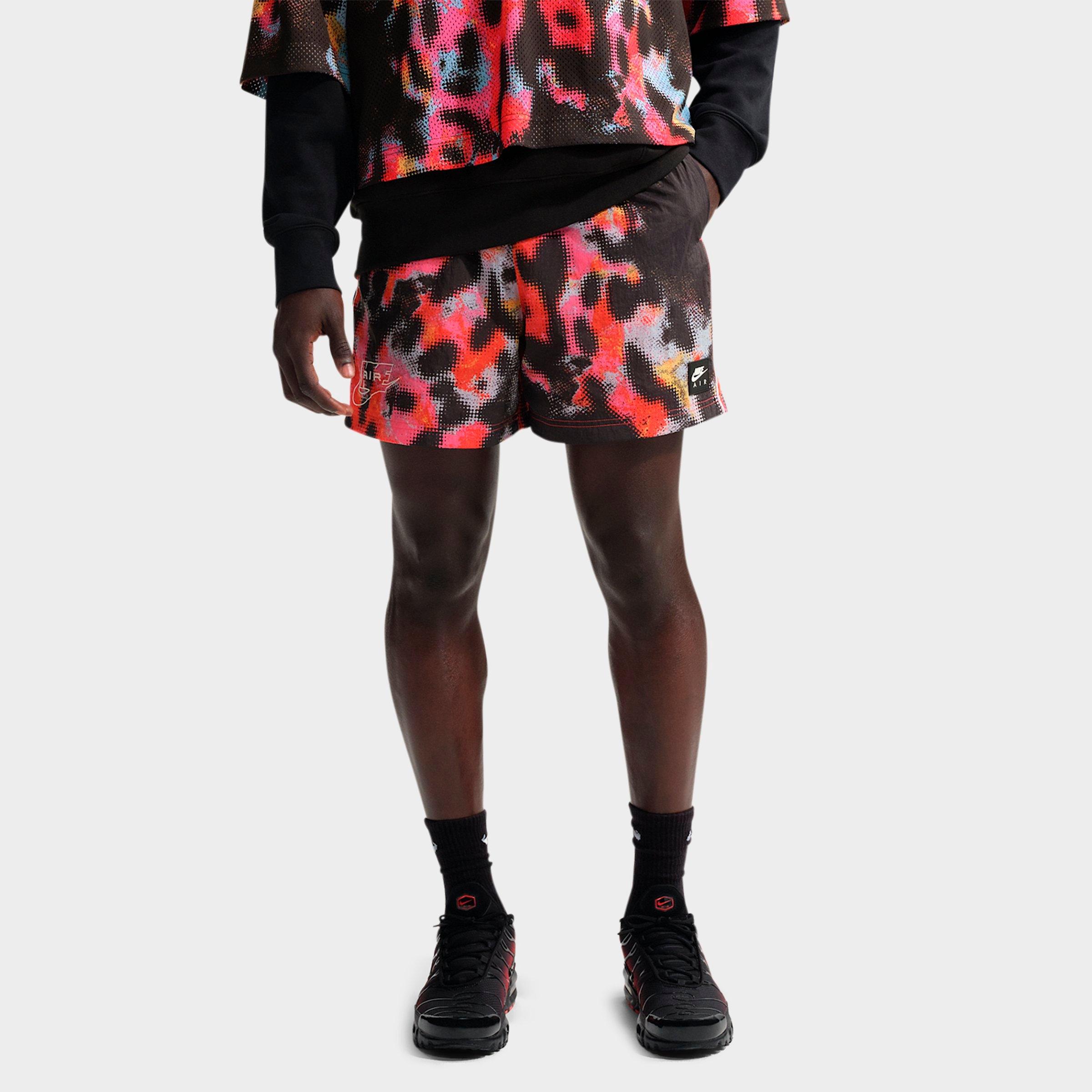 Click here for Nike Mens Air Printed Woven Shorts in Light Crimso... prices