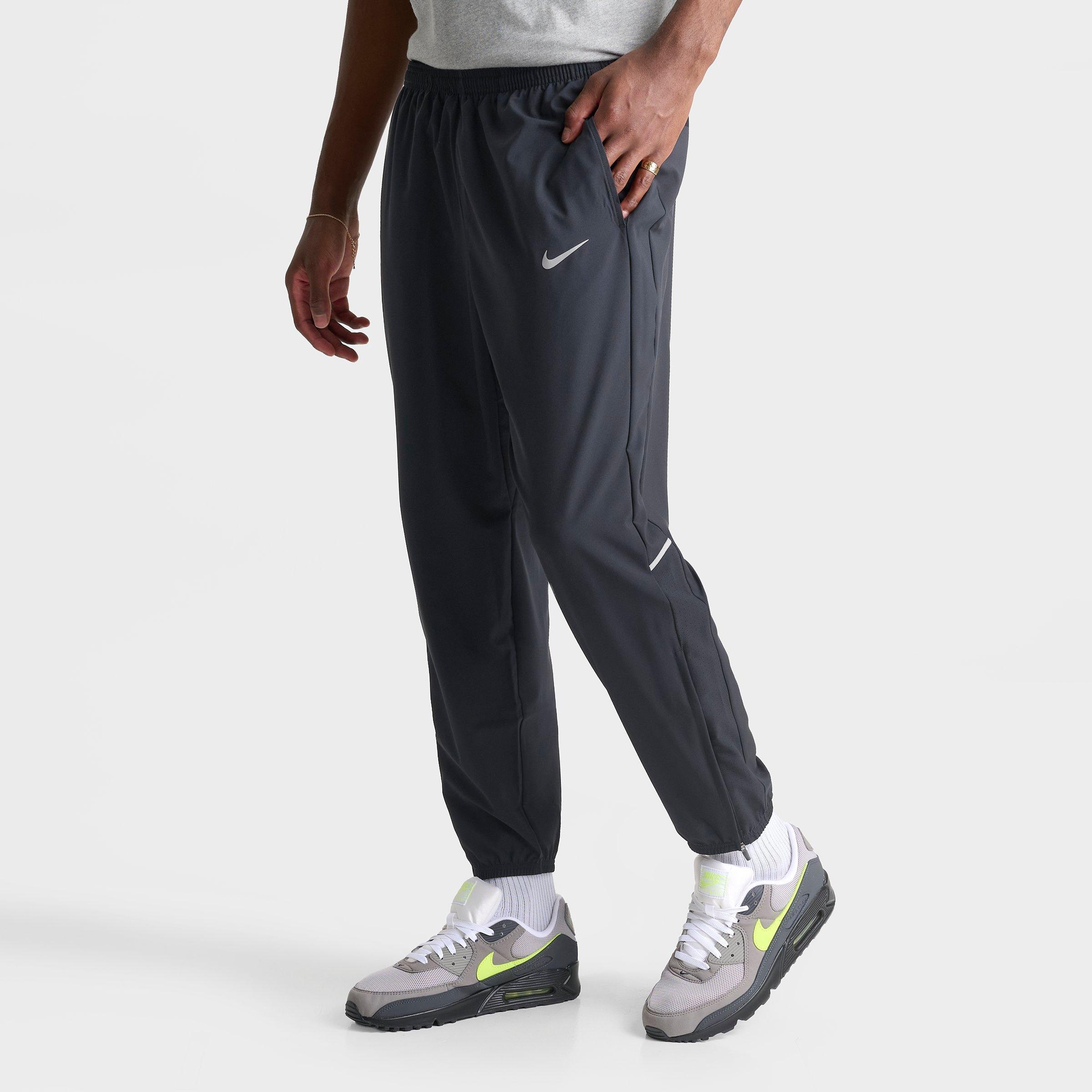 Click here for Nike Mens Miler Dri-FIT Woven Running Pants in Bla... prices