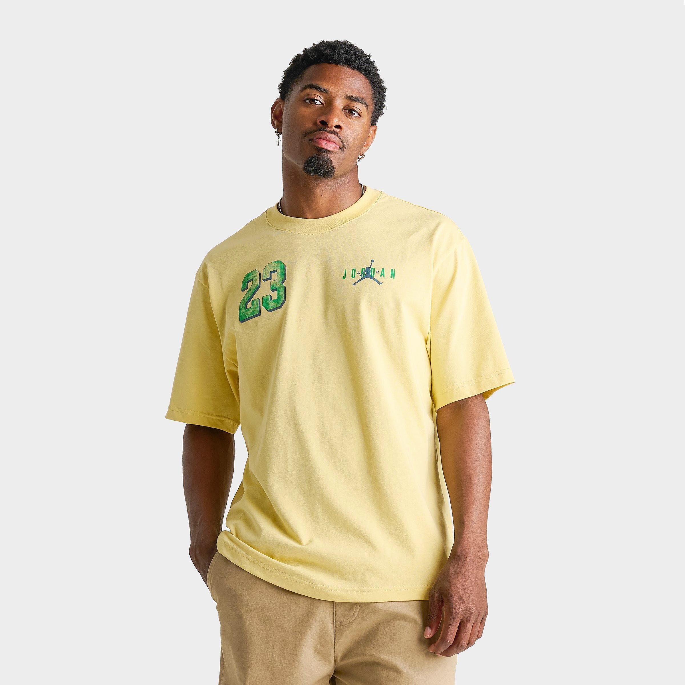 Click here for Jordan Mens Varsity 23 T-Shirt in lemon wash/lucky... prices