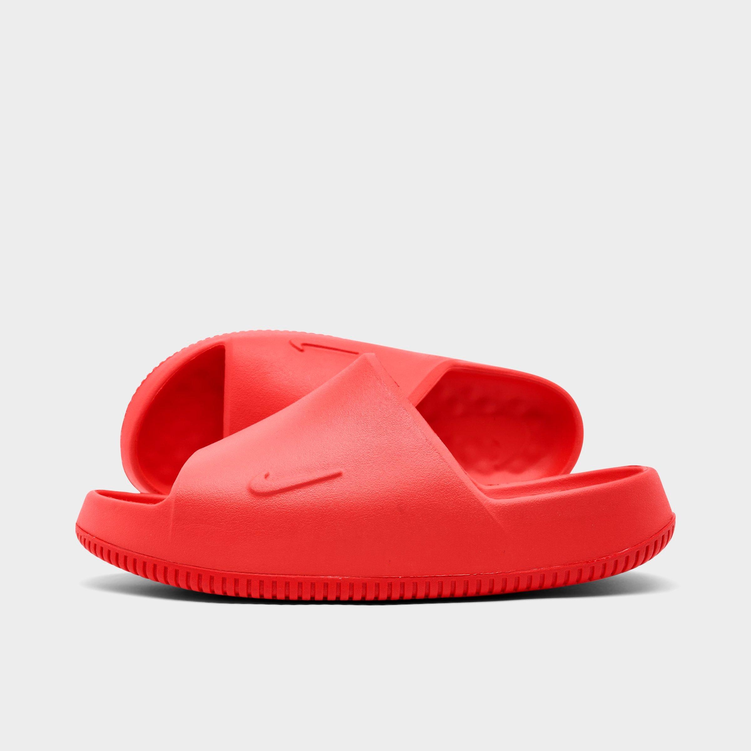 Click here for Nike Big Kids Calm 2.0 Slide Sandals in Light Crim... prices