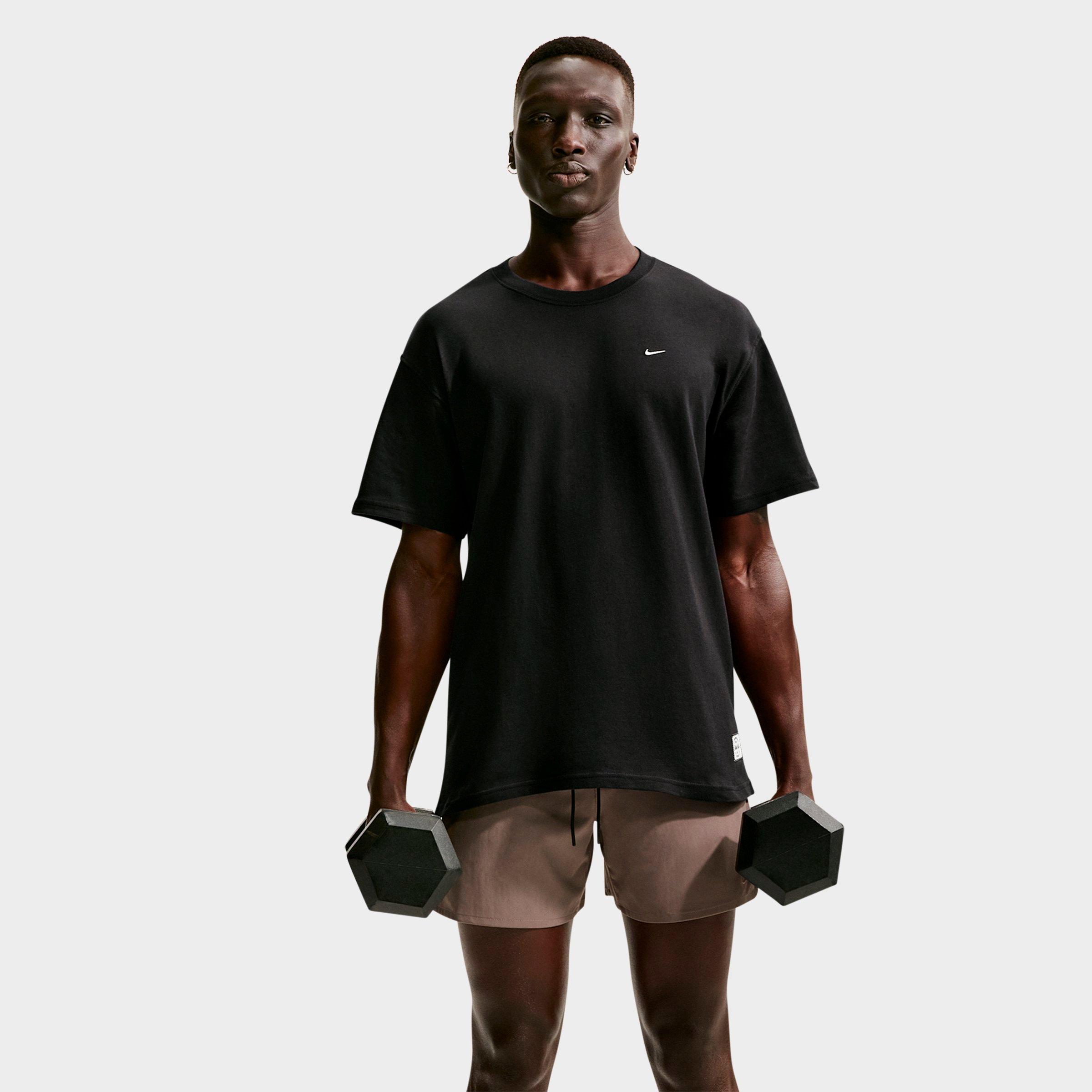 Click here for Nike Mens N. A.C. Established 1972 T-Shirt in Blac... prices