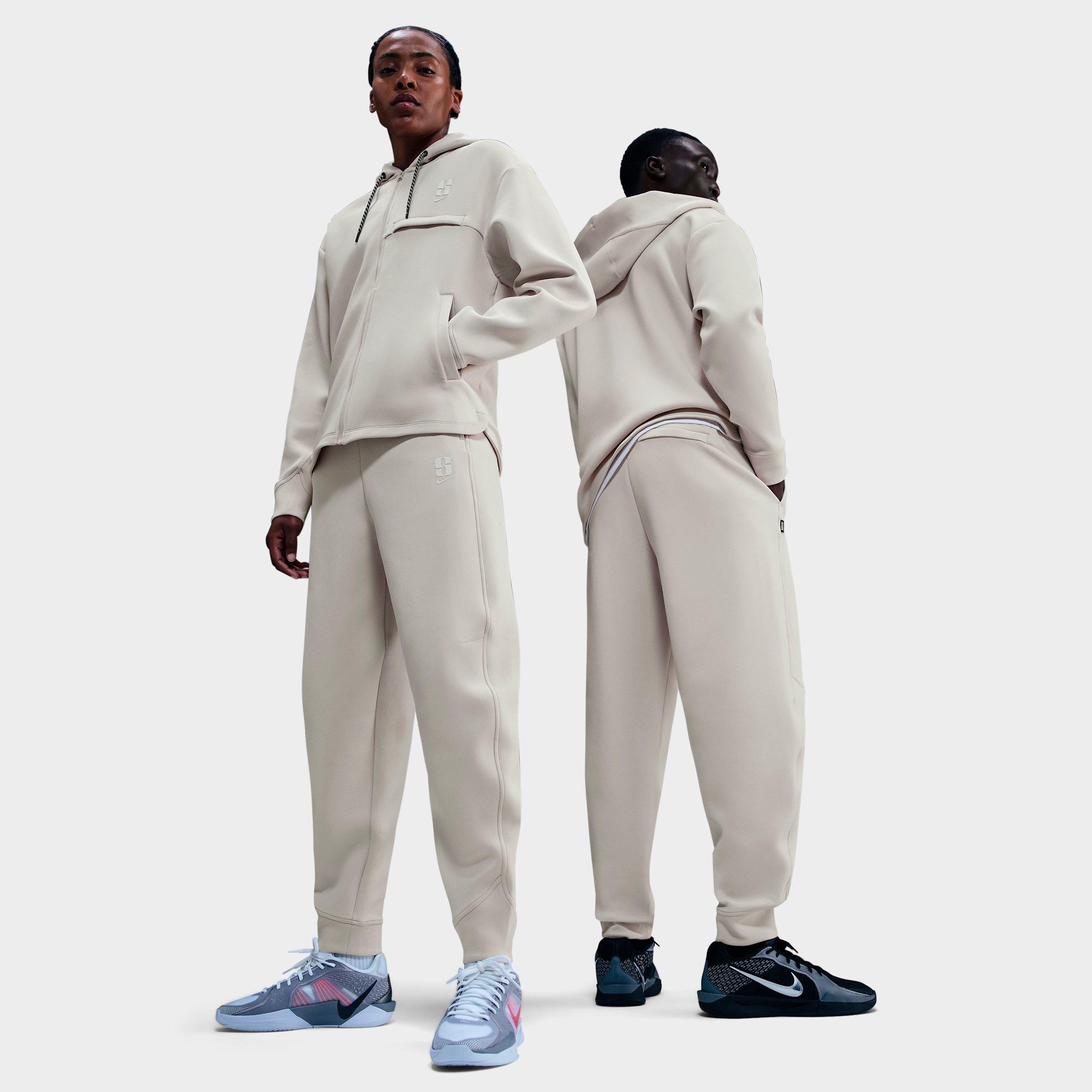 Click here for Nike Dri-FIT Sabrina Signature Jogger Pants in Lig... prices