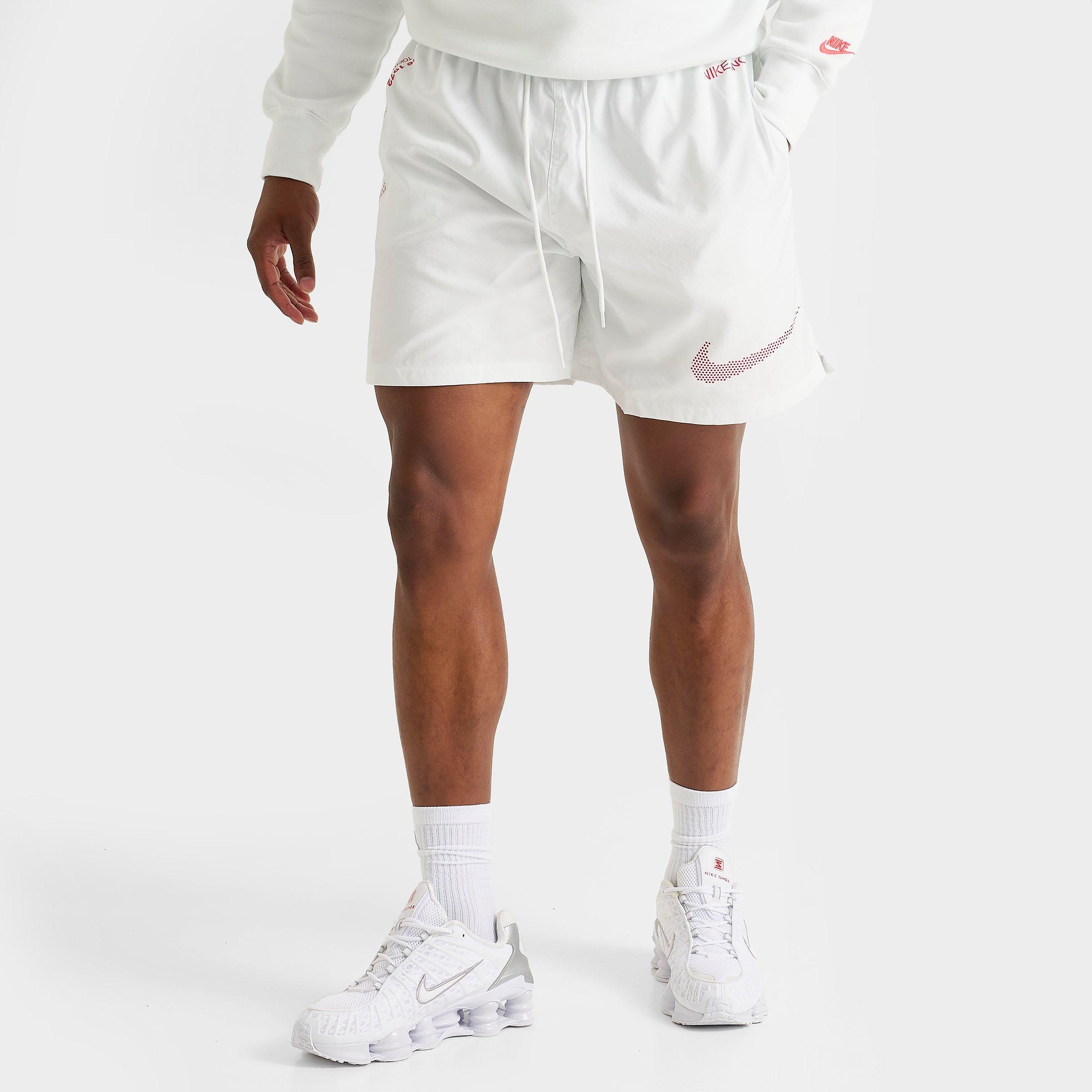 Click here for Nike Mens Club Flow Swoosh Woven Shorts in Summit... prices