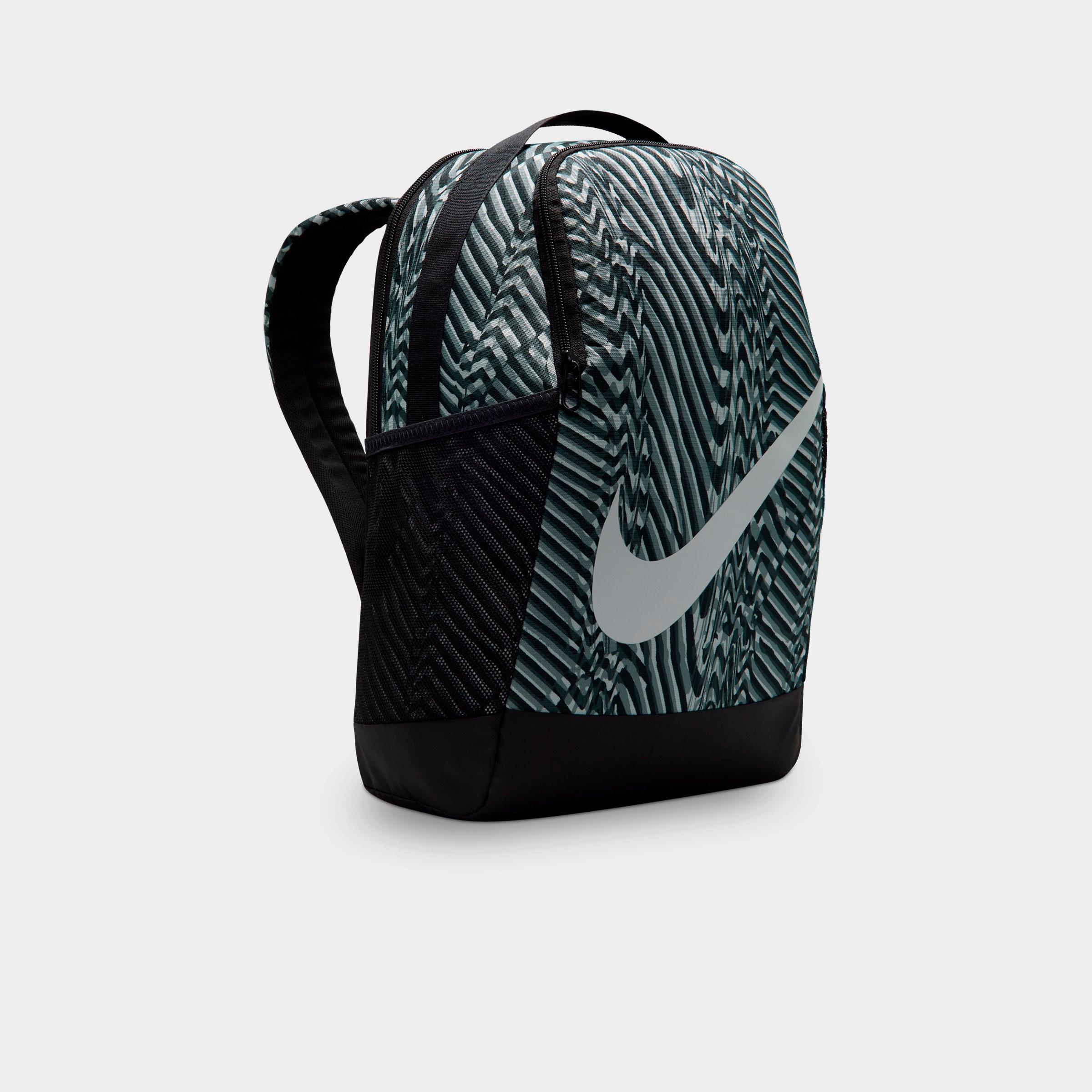 Click here for Nike Kids Brasilia Allover Print Backpack (18L) in... prices
