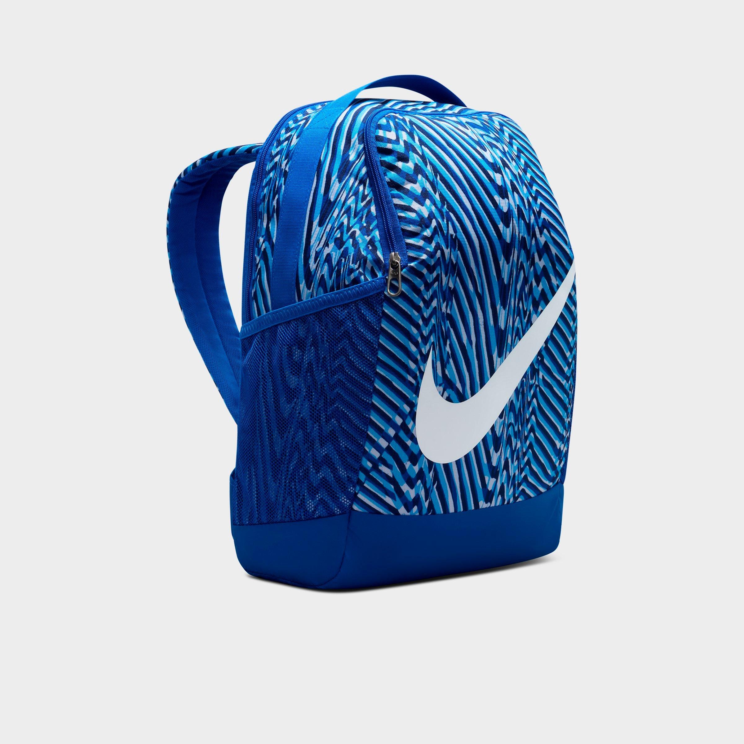 Click here for Nike Kids Brasilia Allover Print Backpack (18L) in... prices