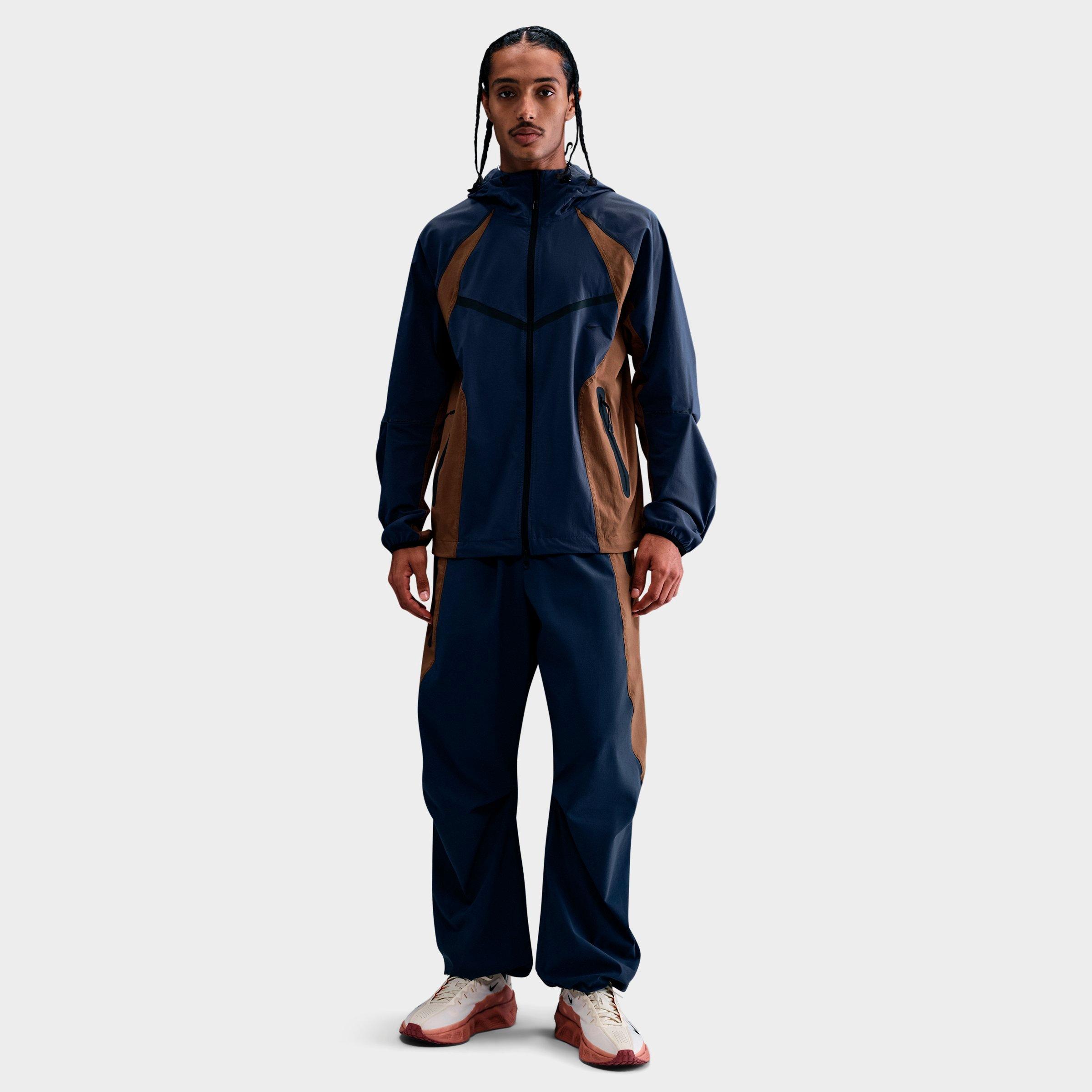 Click here for Nike Mens Tech Dri-FIT Woven Windrunner Loose Jack... prices