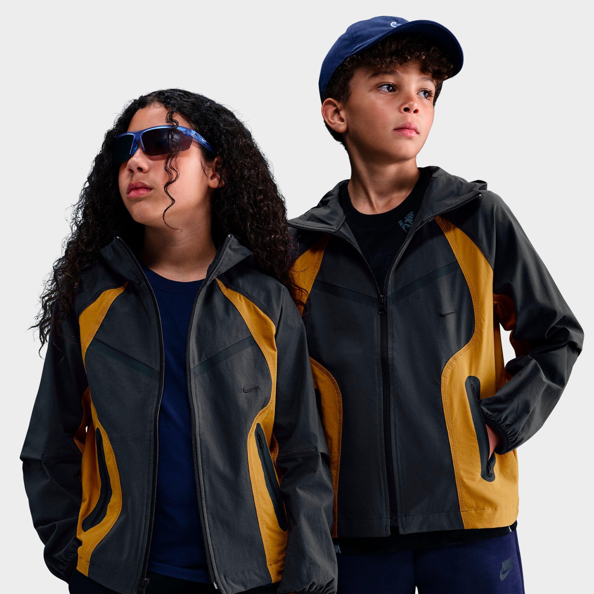 Click here for Nike Big Kids Tech Woven Jacket in Anthracite/Ochr... prices