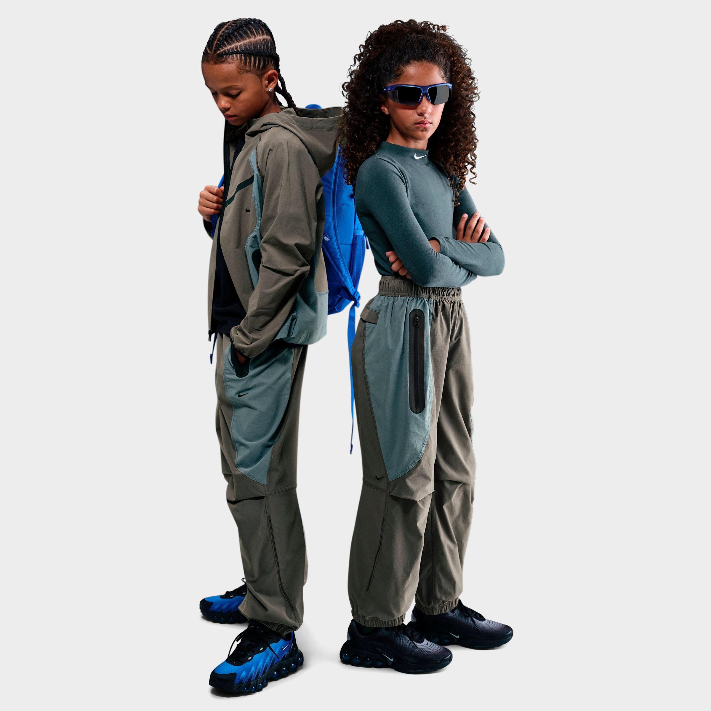 Click here for Nike Big Kids Tech Woven Jogger Pants in Cave Ston... prices