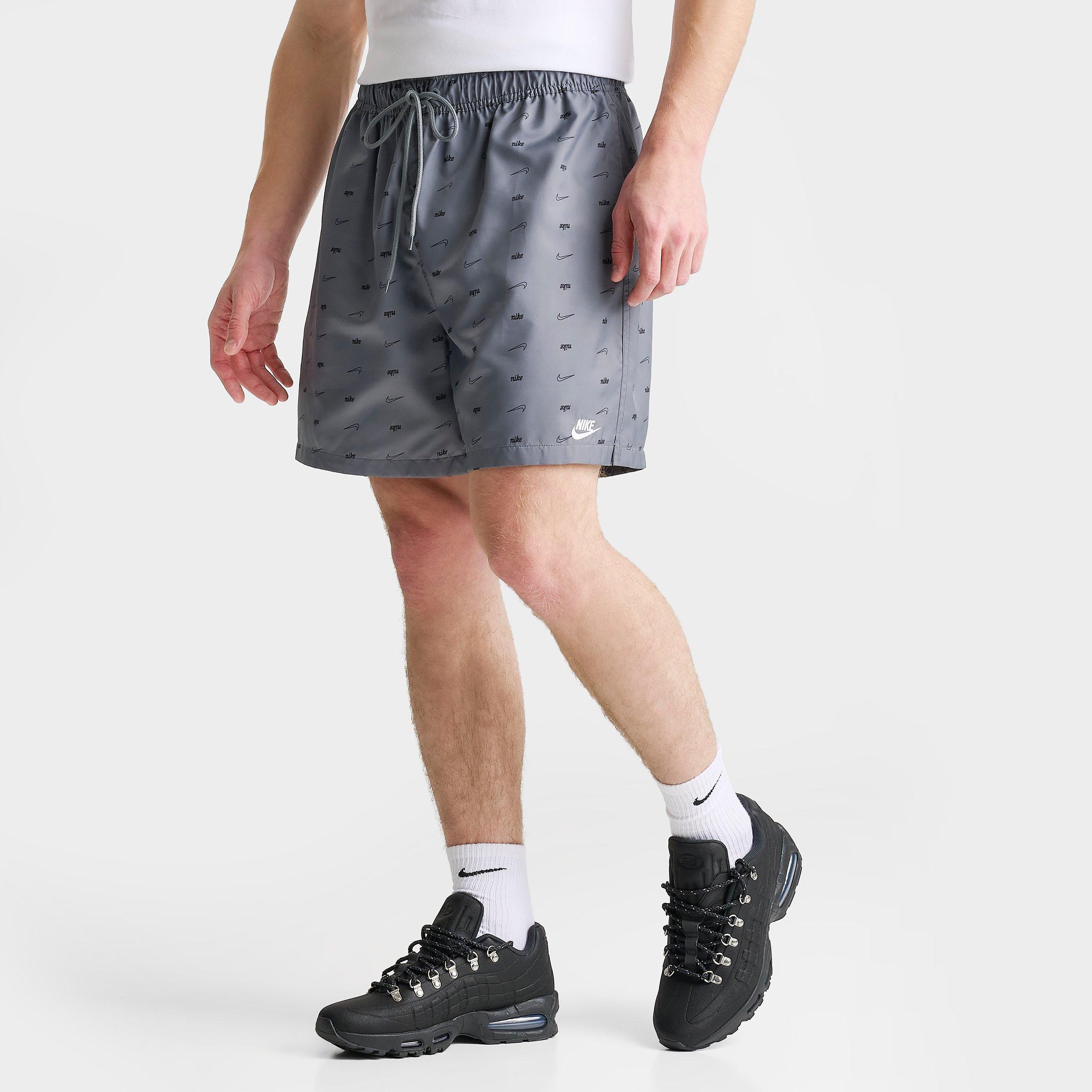 Click here for Nike Mens Sportswear Club Monogram Woven Flow Shor... prices