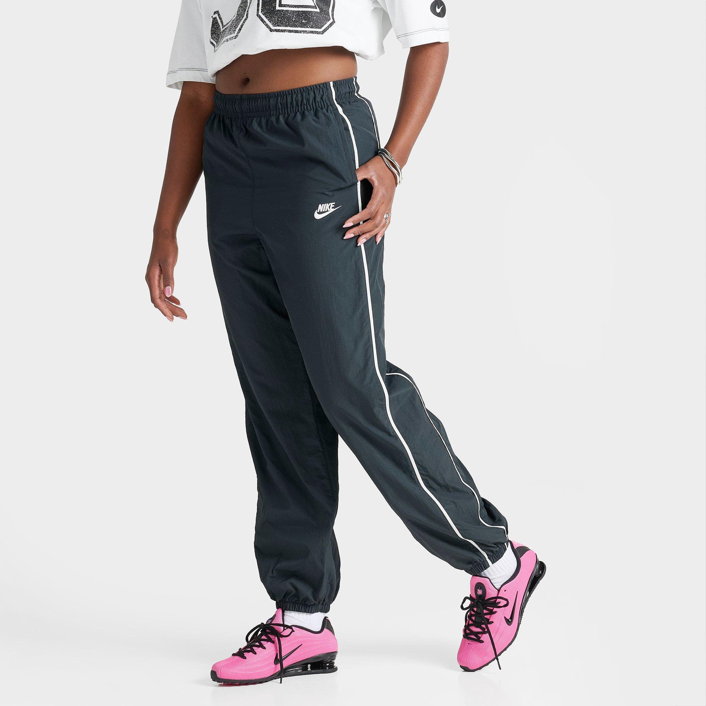 Click here for Nike Womens Sportswear Windrunner Woven Jogger Pan... prices
