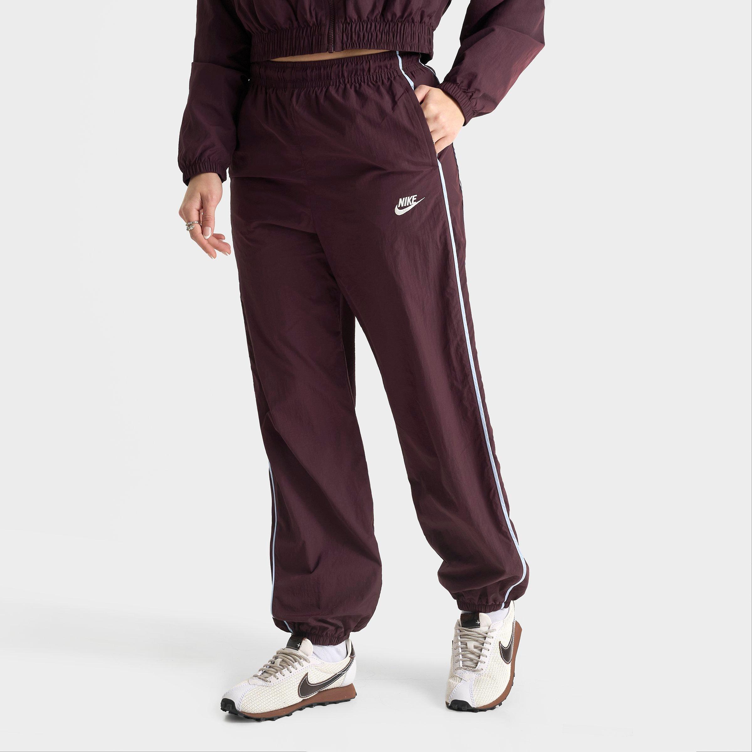Click here for Nike Womens Sportswear Windrunner Woven Jogger Pan... prices