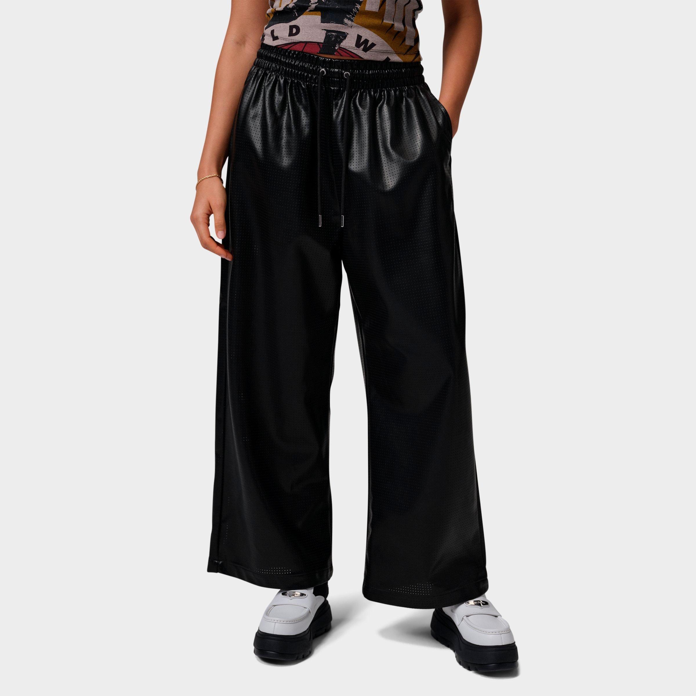 Click here for Nike Womens Jordan Flight Faux-Leather Pants in Bl... prices