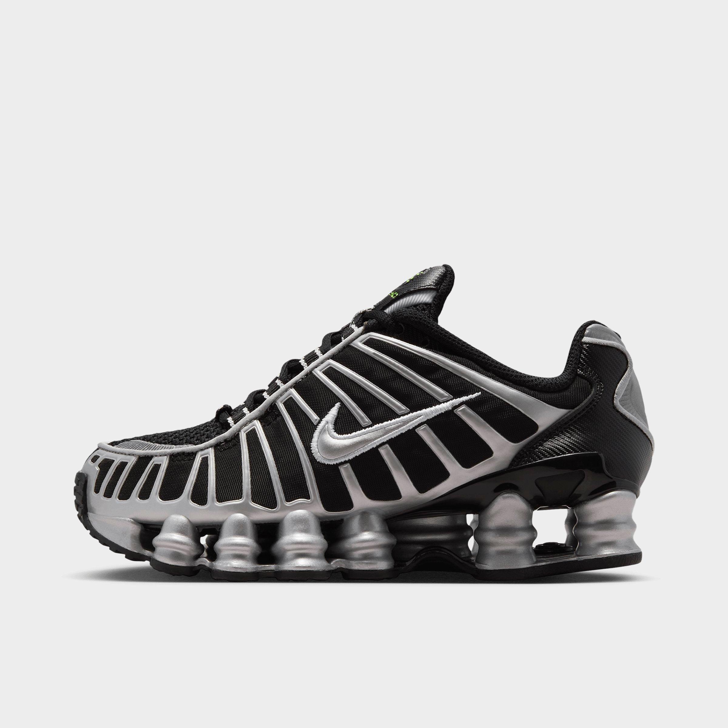 Click here for Nike Big Kids Shox TL Casual Shoes in Black/Volt I... prices