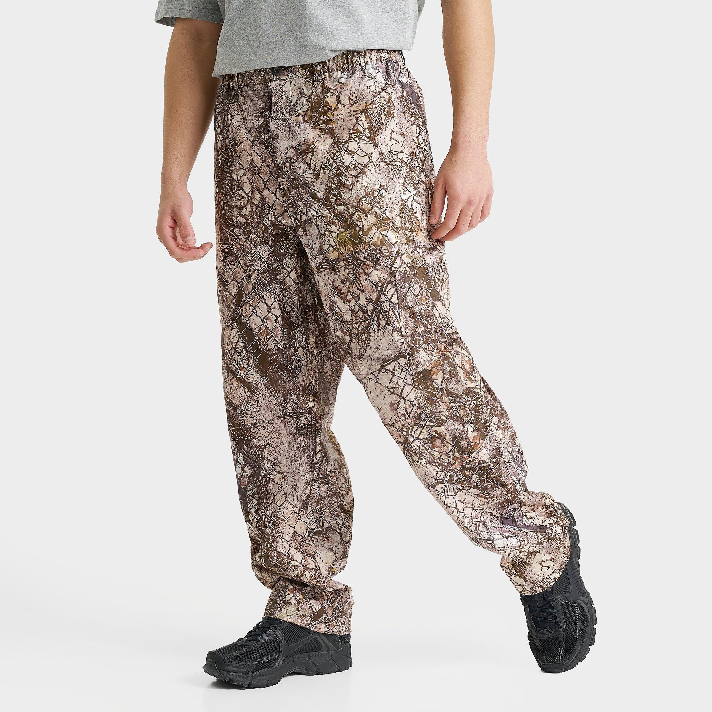Click here for Nike Mens Club Chain Camo Woven Cargo Pants in Kha... prices