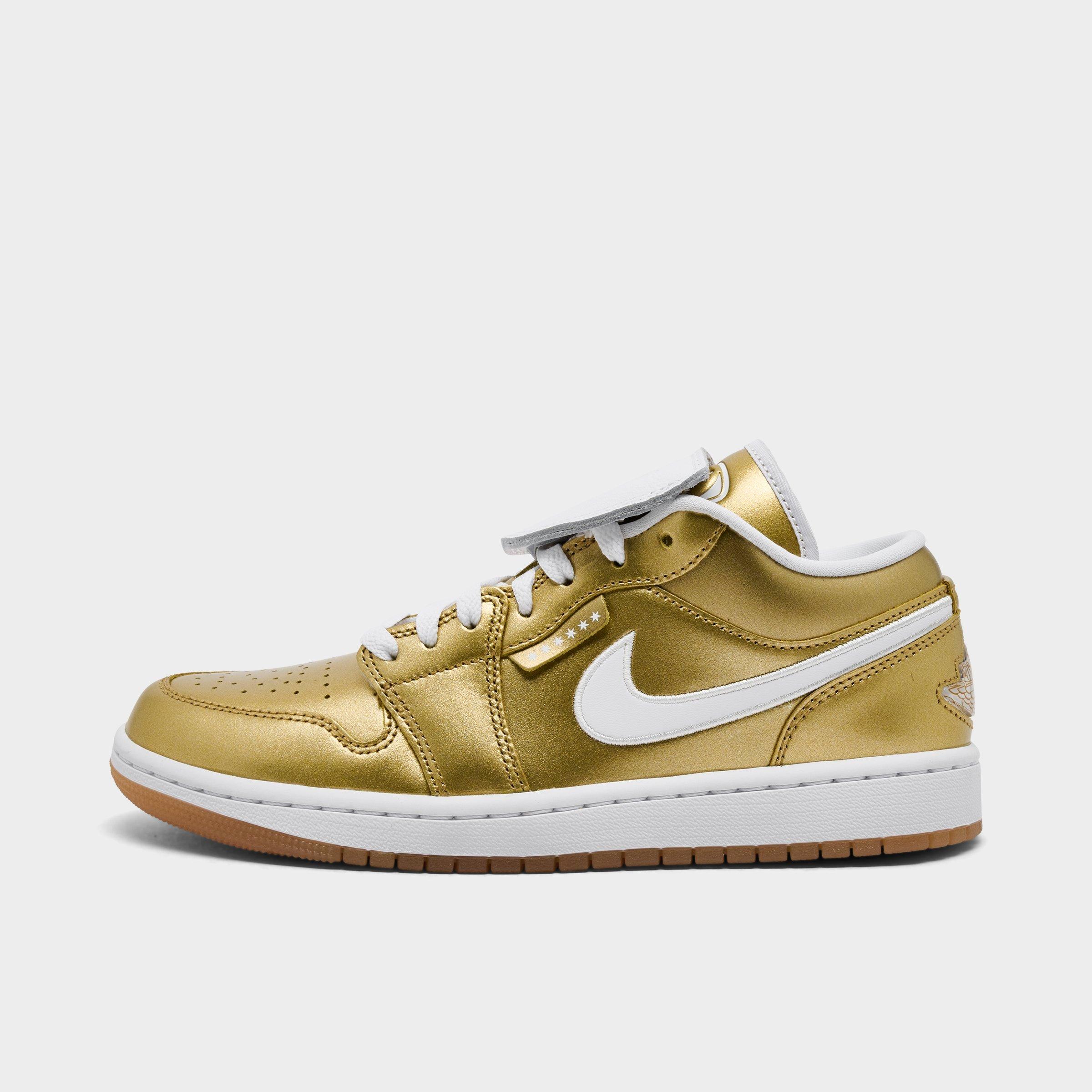 Click here for Jordan Womens Air 1 Low SE Casual Shoes in gold/go... prices