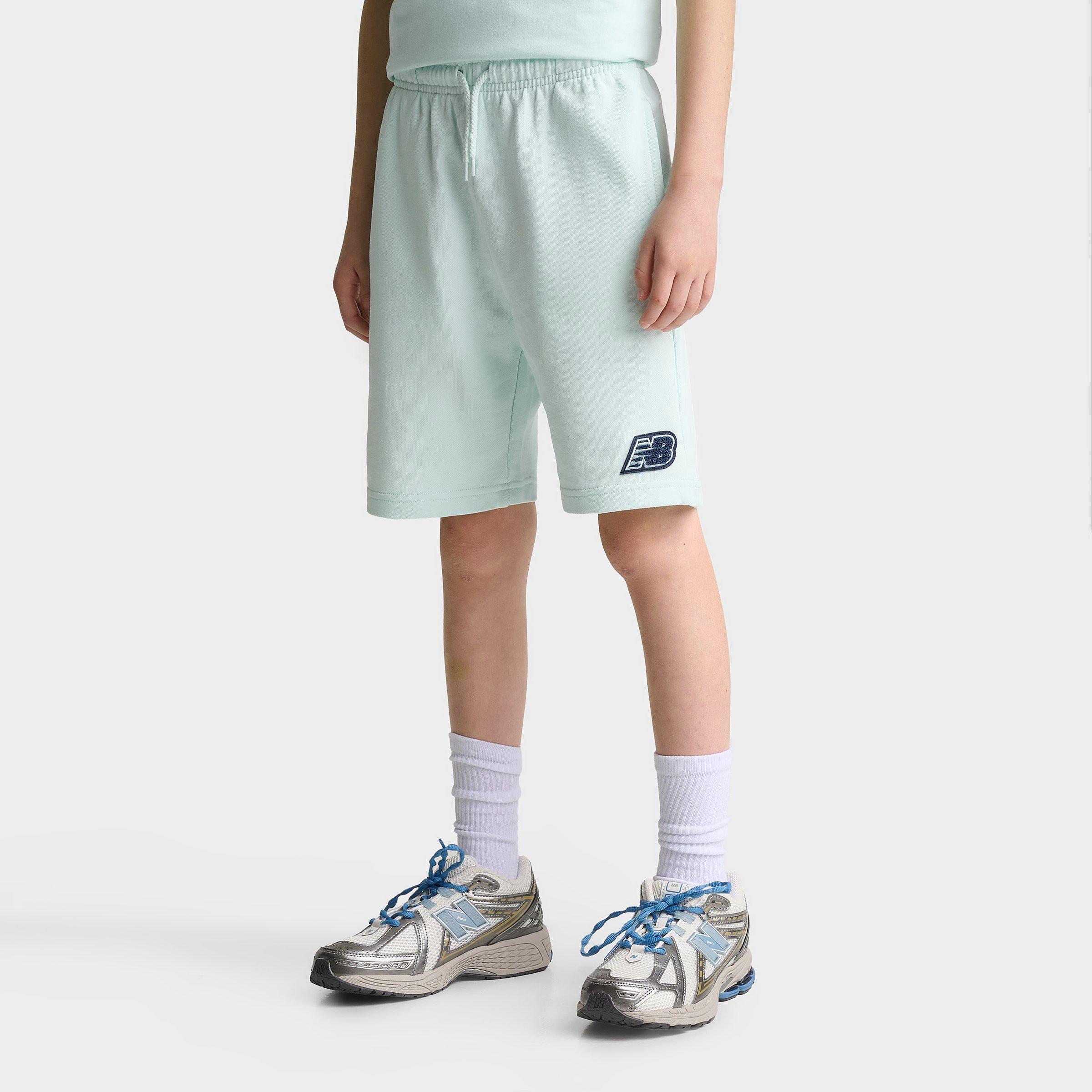 Click here for New Balance Big Kids French Terry Shorts in Glint... prices