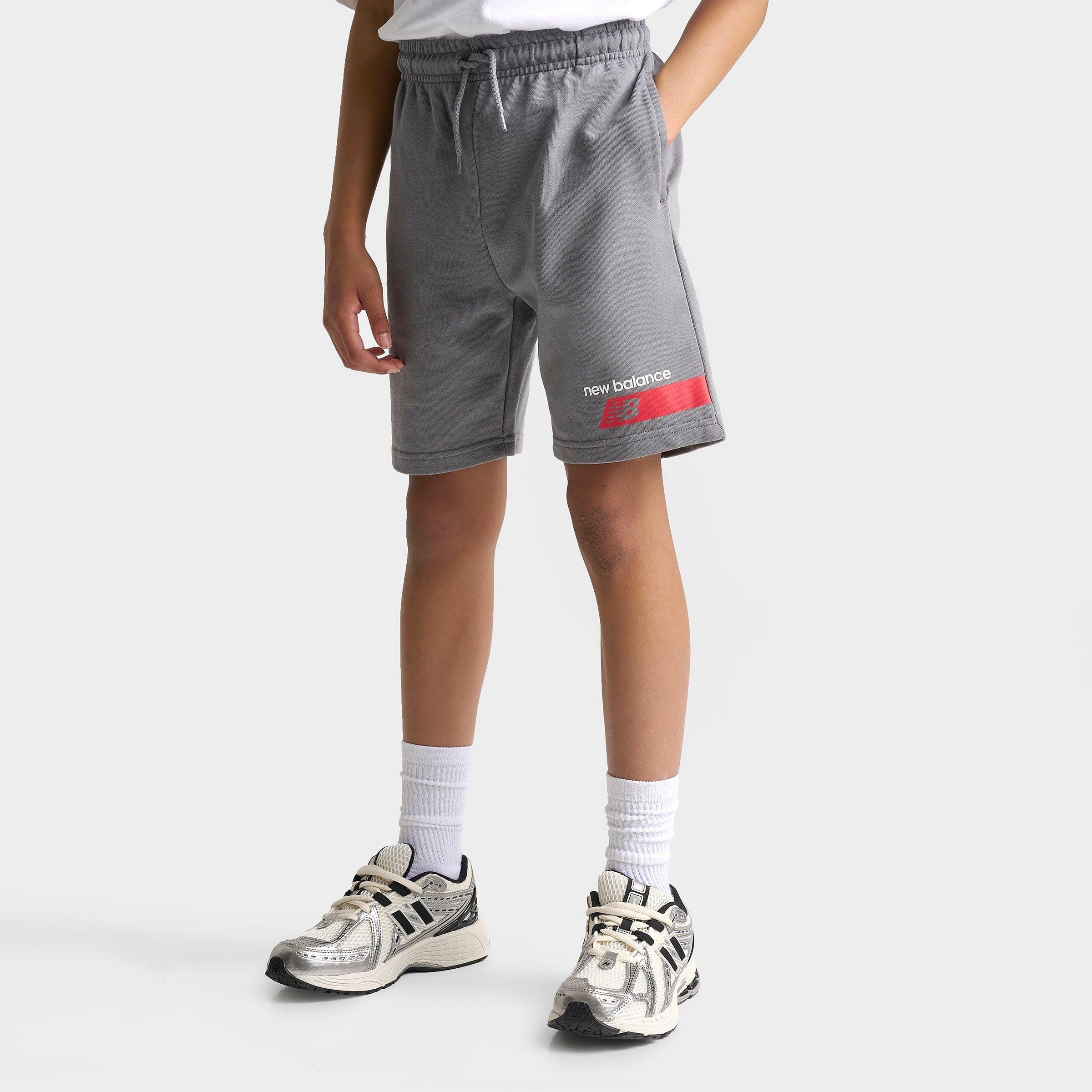 Click here for New Balance Big Kids Players French Terry Shorts i... prices