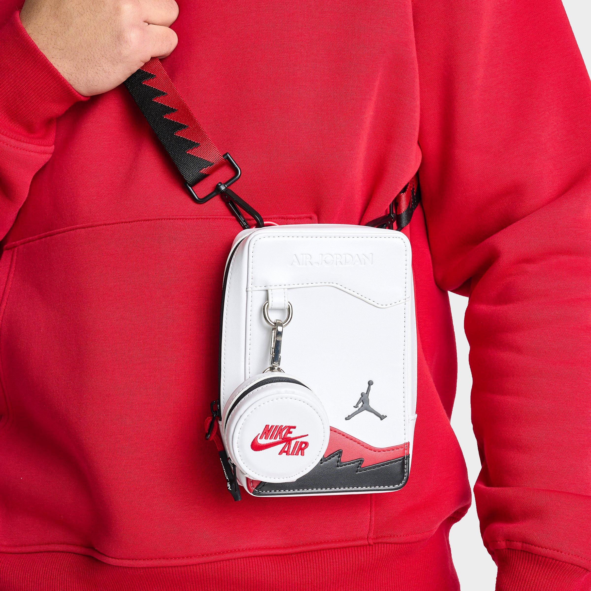 Click here for Jordan Jam AJ5 Crossbody Bag (1L) in Fire Red/Whit... prices