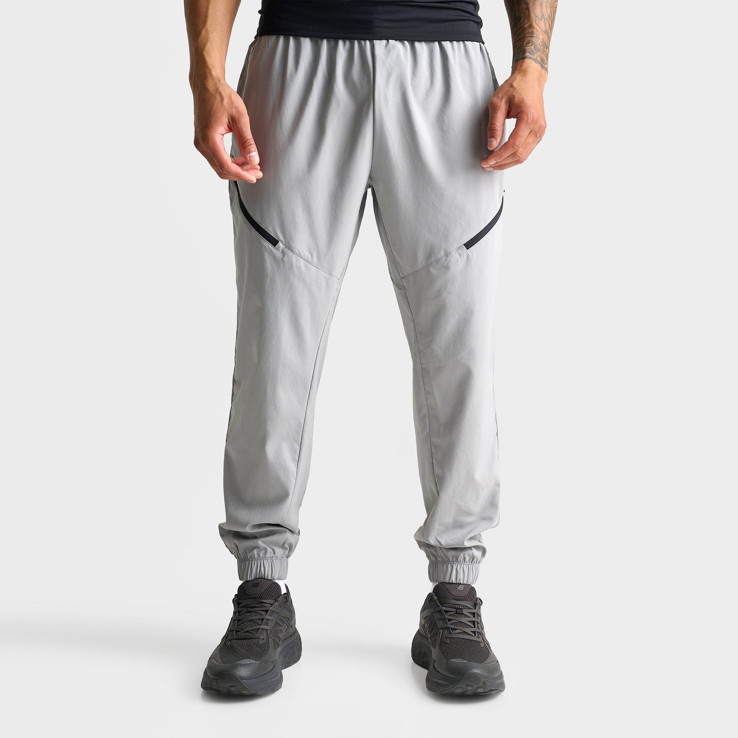 Click here for New Balance Mens Woven Zip Pocket Jogger Pants in... prices