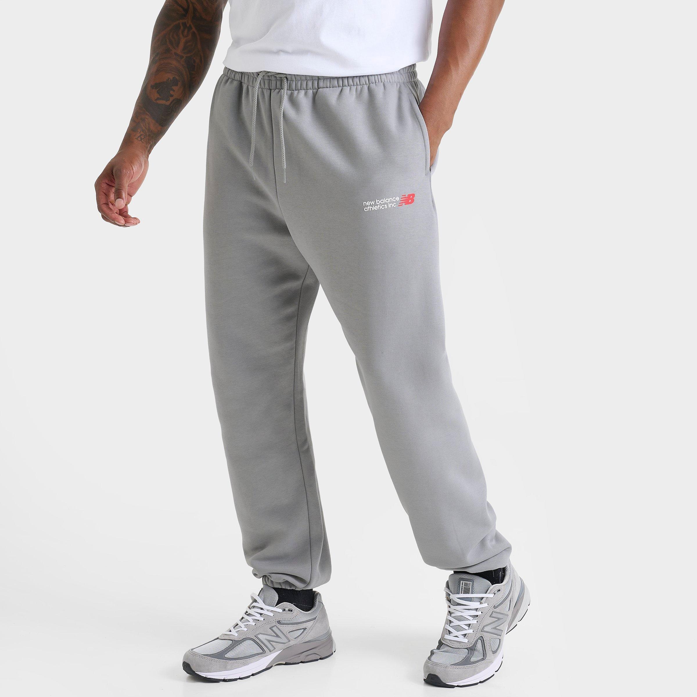 Click here for New Balance Mens Athletics Flying NB Logo Jogger S... prices
