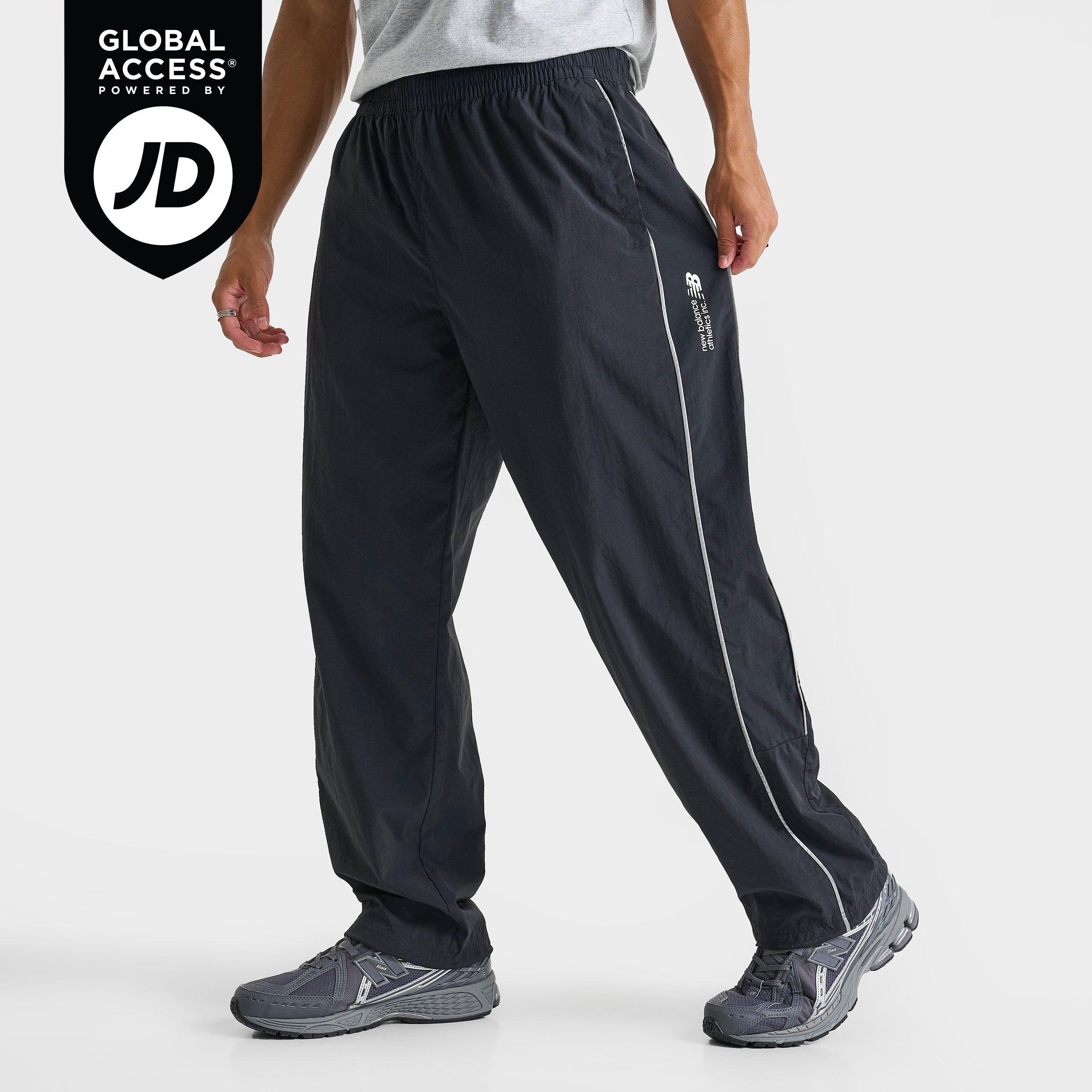 Click here for New Balance Mens Vision Track Pants in Black/Refle... prices