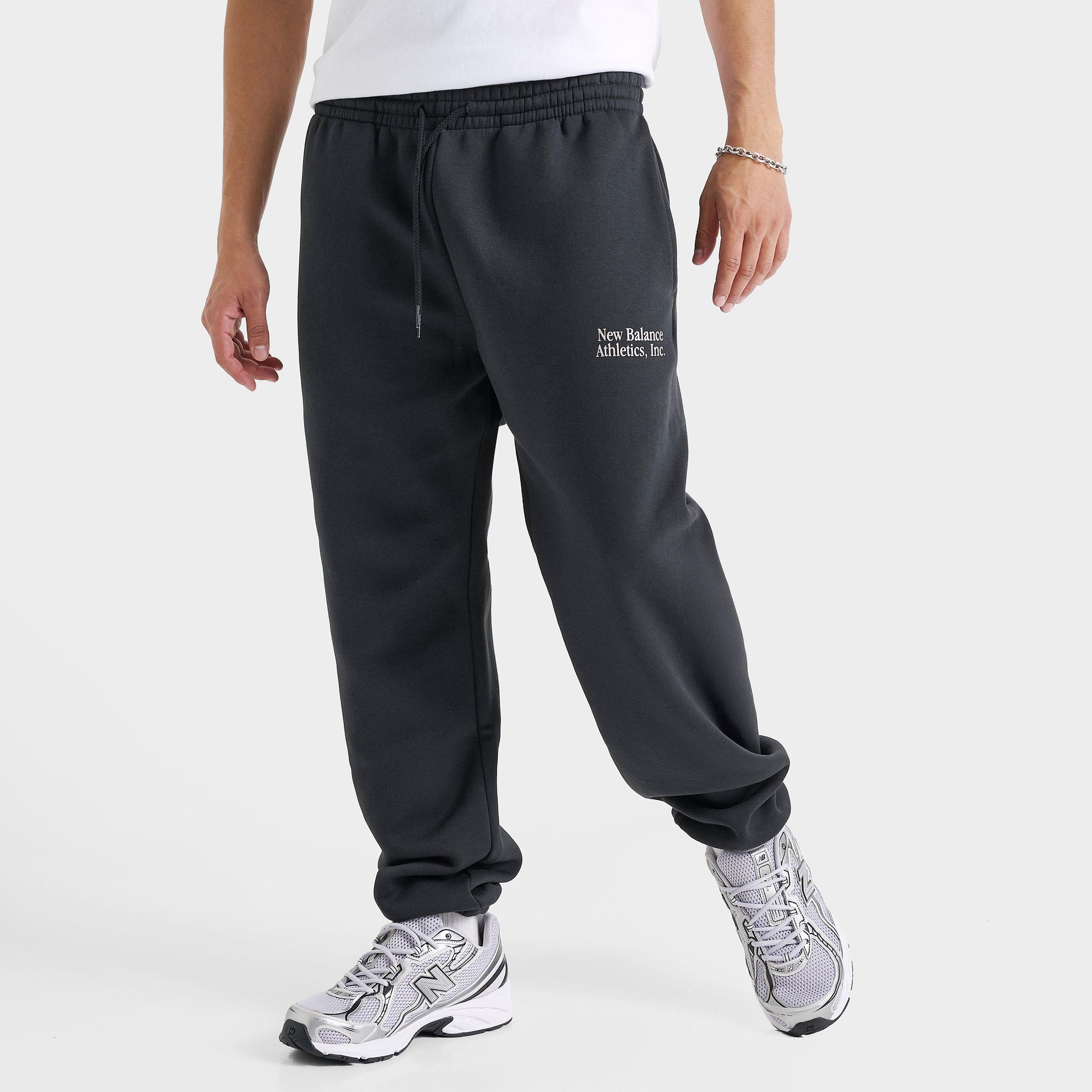Click here for New Balance Mens Copper Fleece Jogger Pants in Bla... prices