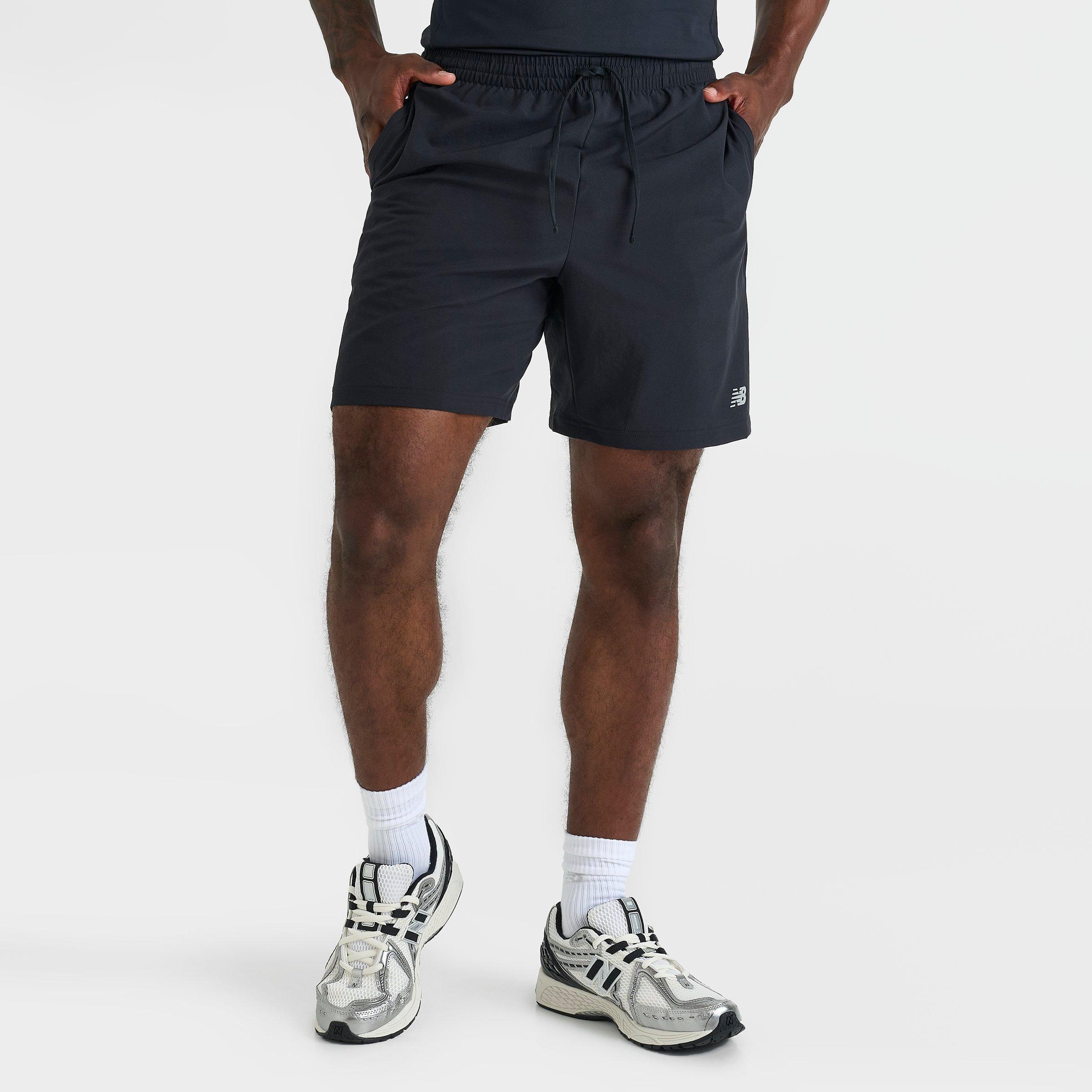 Click here for New Balance Mens Sport Essential 7 Woven Shorts in... prices