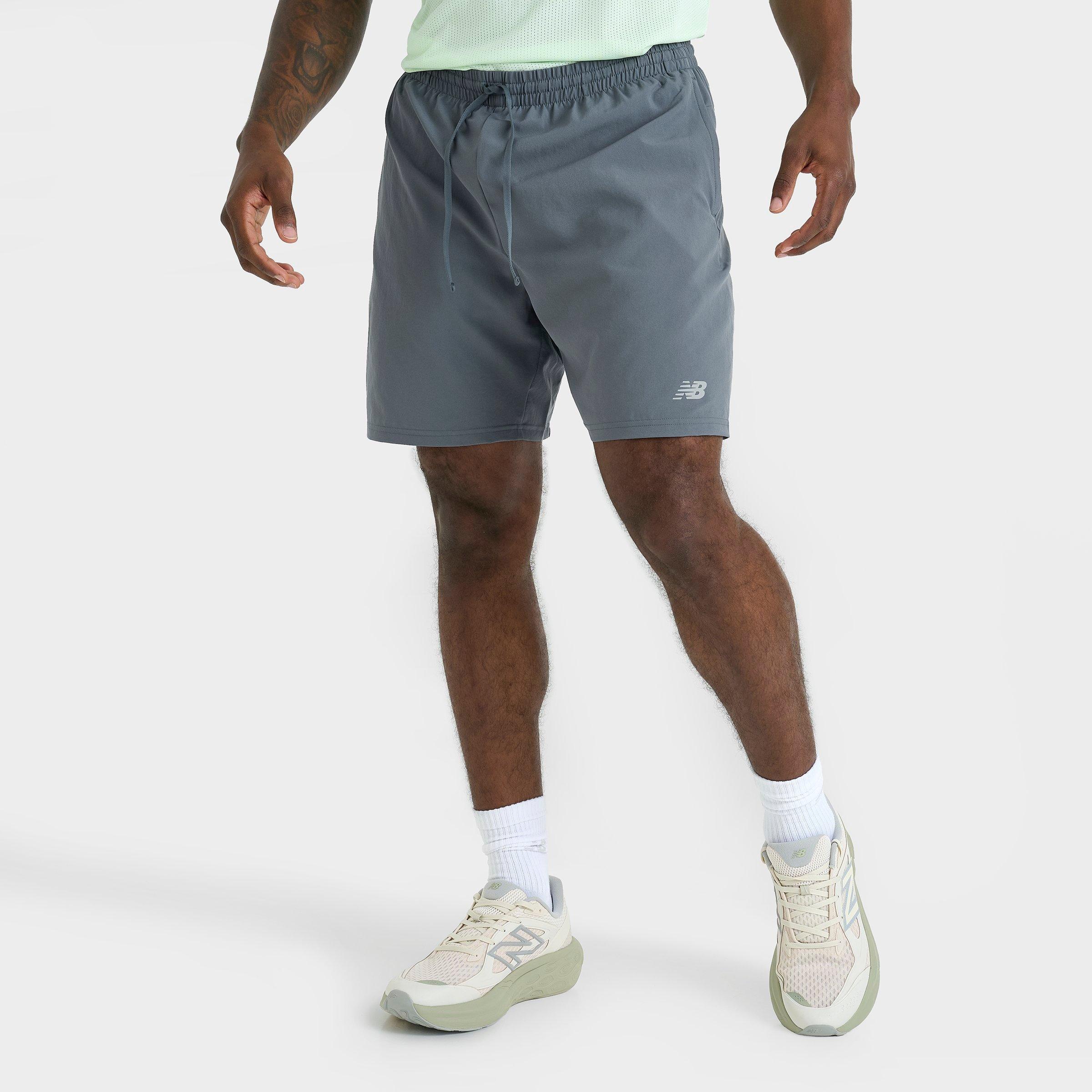 Click here for New Balance Mens Sport Essential 7 Woven Shorts in... prices