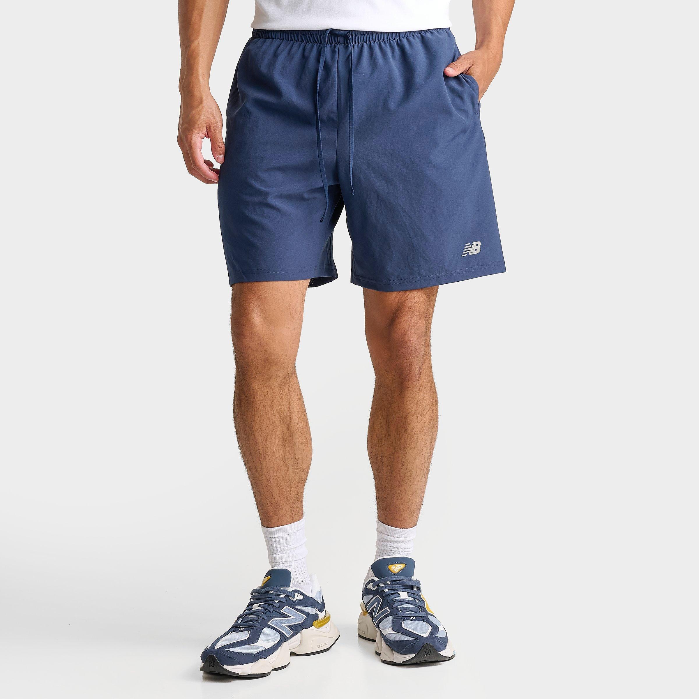 Click here for New Balance Mens Sport Essential 7 Woven Shorts in... prices
