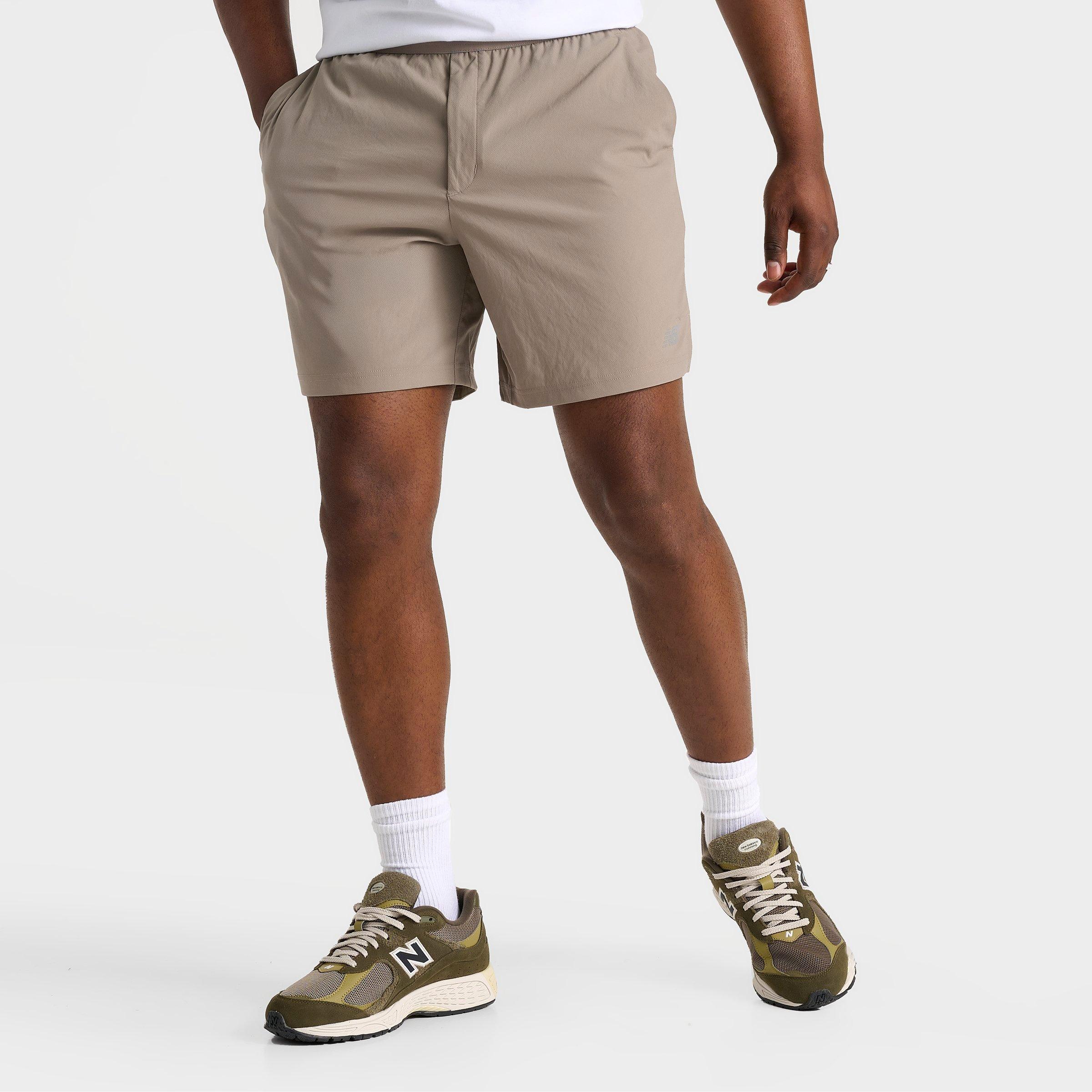 Click here for New Balance Mens Super Run Running Shorts in Beige... prices